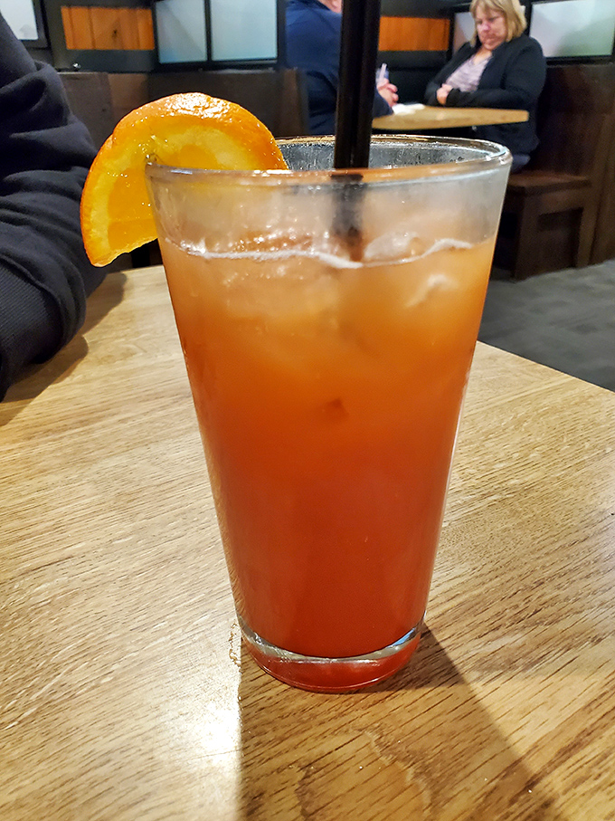 This isn't just a cocktail &ndash; it's liquid sunshine with an orange slice smile. The perfect companion while you contemplate which steak to order.