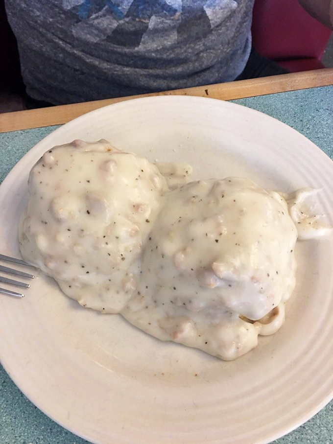 Biscuits and gravy that don't mess around &ndash; a cloud-like blanket of peppery white gravy that transforms humble biscuits into breakfast royalty.