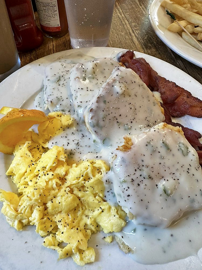 Behold the legendary biscuits and gravy&mdash;where pepper-speckled cream sauce blankets fresh-baked biscuits with the tenderness of a lullaby.