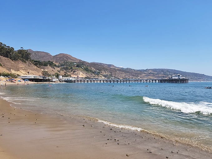 Not all piers are created equal. This one stretches into the Pacific like a wooden runway, connecting land-dwellers to the ocean's endless possibilities.