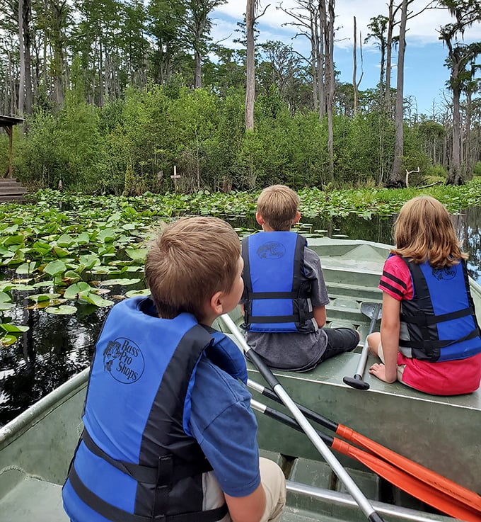 Three junior explorers discovering that iPads can't compete with actual lily pads and the creatures that call them home.