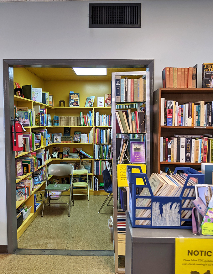 The book nook: where literary adventures cost less than a cup of coffee and the yellow walls practically radiate cheerfulness.