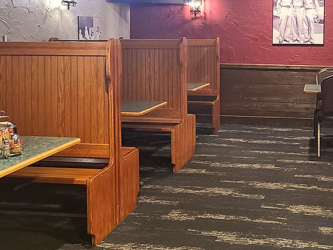 Classic wooden booths offer that old-school pizzeria comfort &ndash; where countless family dinners and first dates have unfolded over slices and stories.