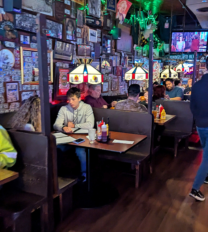 Booths bathed in the warm glow of vintage lamps. The walls aren't decorated&mdash;they're insulated with decades of memories and memorabilia.