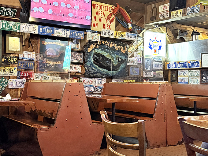 The walls aren't just decorated, they're documented with license plates from every corner of America &ndash; a road trip in restaurant form.