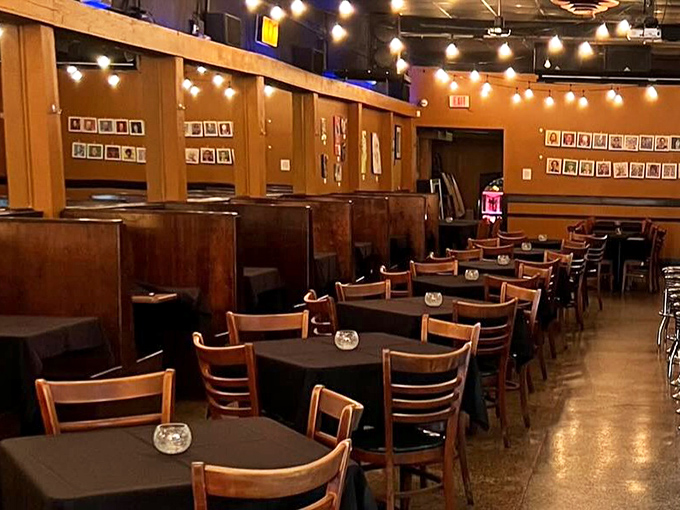 Wooden booths offer cozy sanctuaries for serious grilled cheese contemplation, string lights overhead adding just the right touch of whimsy.