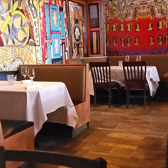 Intimate seating surrounded by original artwork makes every table feel like you've discovered your own private dining sanctuary.