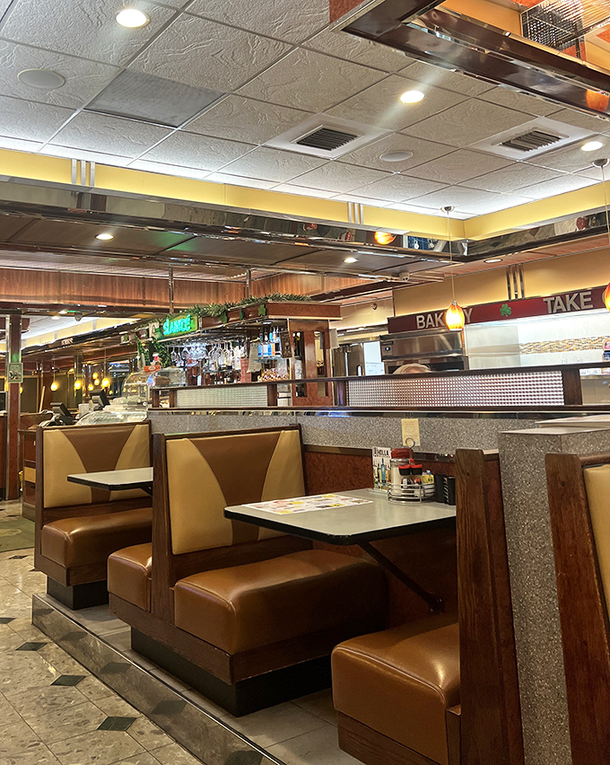 Booths designed for comfort and conversation, where countless family stories have unfolded over coffee refills and shared desserts.