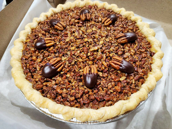 Bourbon pecan pie that makes you question all other desserts you've ever loved. Those chocolate-dipped pecans are wearing tuxedos to the flavor party.