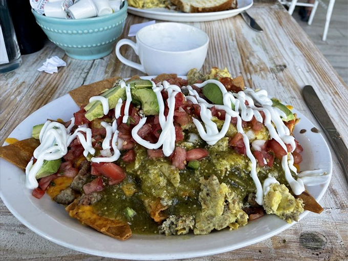 Breakfast nachos that threw out the rulebook. When tortilla chips meet eggs and avocado, conventional breakfast wisdom waves the white flag.