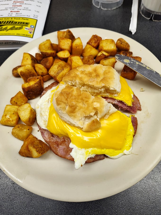 Breakfast perfection: golden potatoes surrounding an egg sandwich that makes morning people out of night owls.