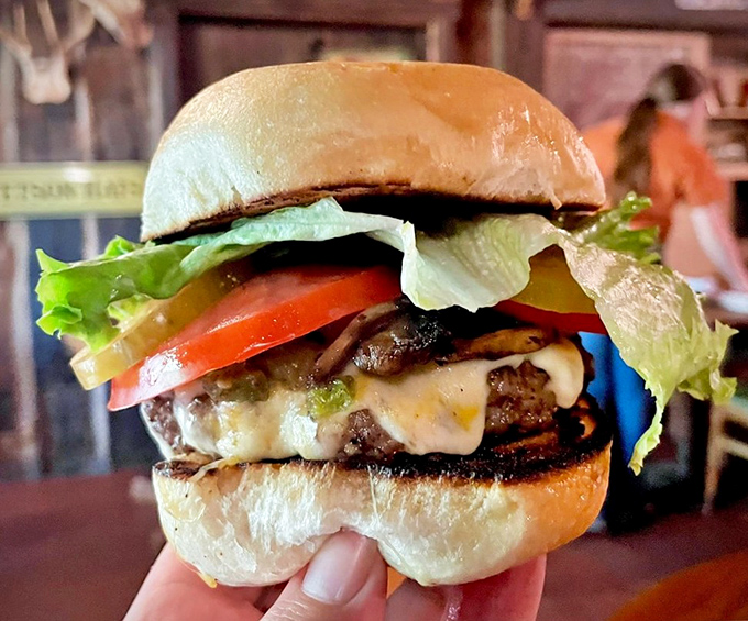 The famous Ranch Burger &ndash; a hand-formed patty topped with melty cheese and fresh veggies that makes fast food chains weep with inadequacy.