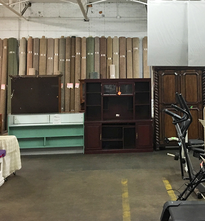 Entertainment centers and cabinets stand like architectural relics from the pre-flatscreen era, ready for creative repurposing.