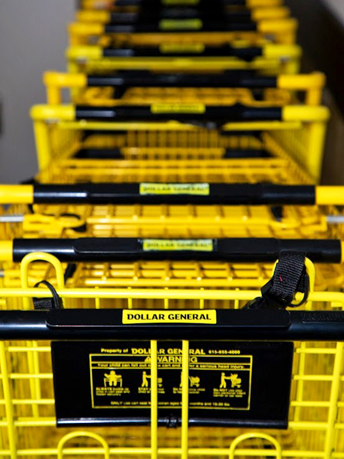 The yellow shopping carts stand at attention, ready for their mission: to somehow end up with more items than you planned to buy.