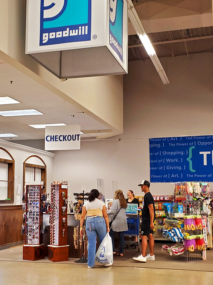 The checkout area: final destination of your treasure hunt journey. That wall proclaims the "Power of Shopping" &ndash; truer words never spoken.