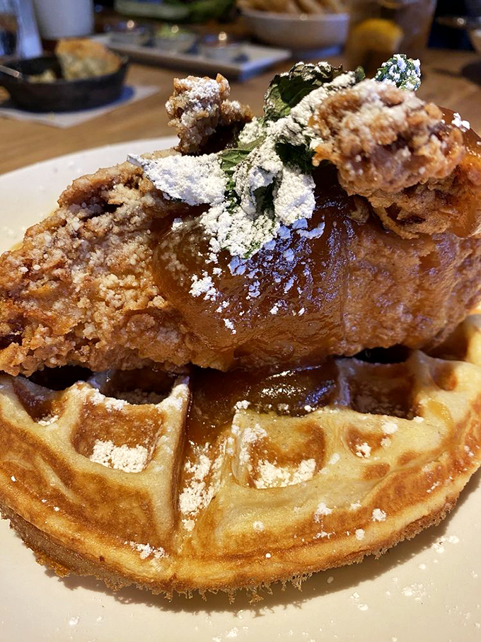 Chicken and waffle that bridges the breakfast-dinner divide so beautifully it deserves its own peace treaty. That maple drizzle should be illegal.