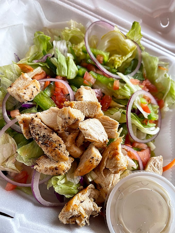A chicken salad that reminds you vegetables are just delivery vehicles for perfectly seasoned protein and creamy dressing.