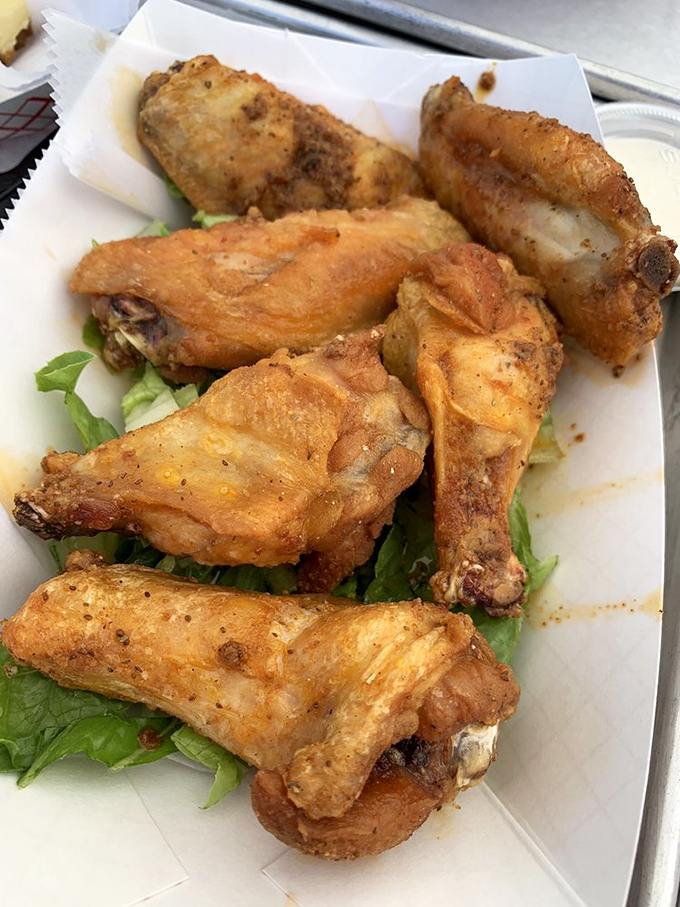Golden fried chicken wings that could convert even the most devoted seafood purist.
