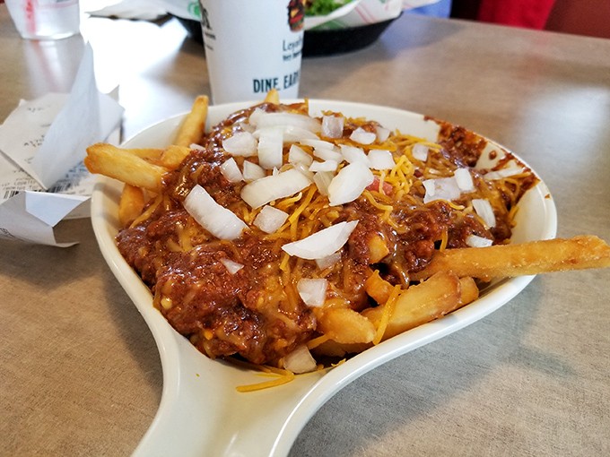 Chili cheese fries &ndash; where comfort food meets excess in the most beautiful way. A fork is suggested but fingers are understood.