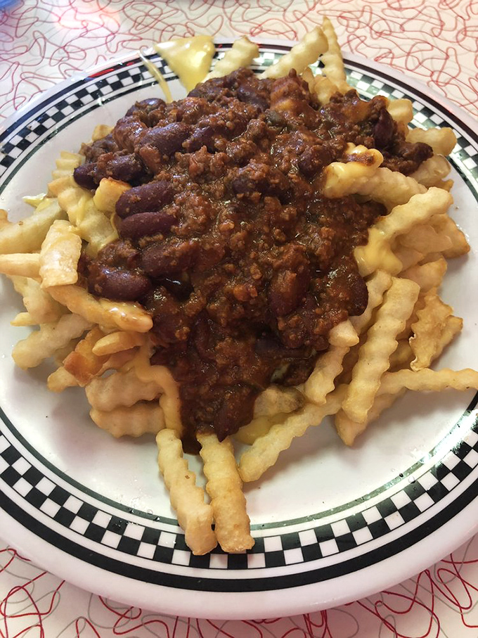Crinkle-cut fries baptized in homemade chili&mdash;a Springfield specialty that laughs in the face of diet plans and wins hearts one meaty, cheesy bite at a time.