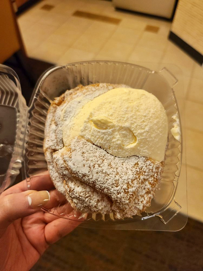 The famous cream puff&mdash;half dessert, half cloud, all delicious. People have been known to drive across state lines for this powdered sugar masterpiece.