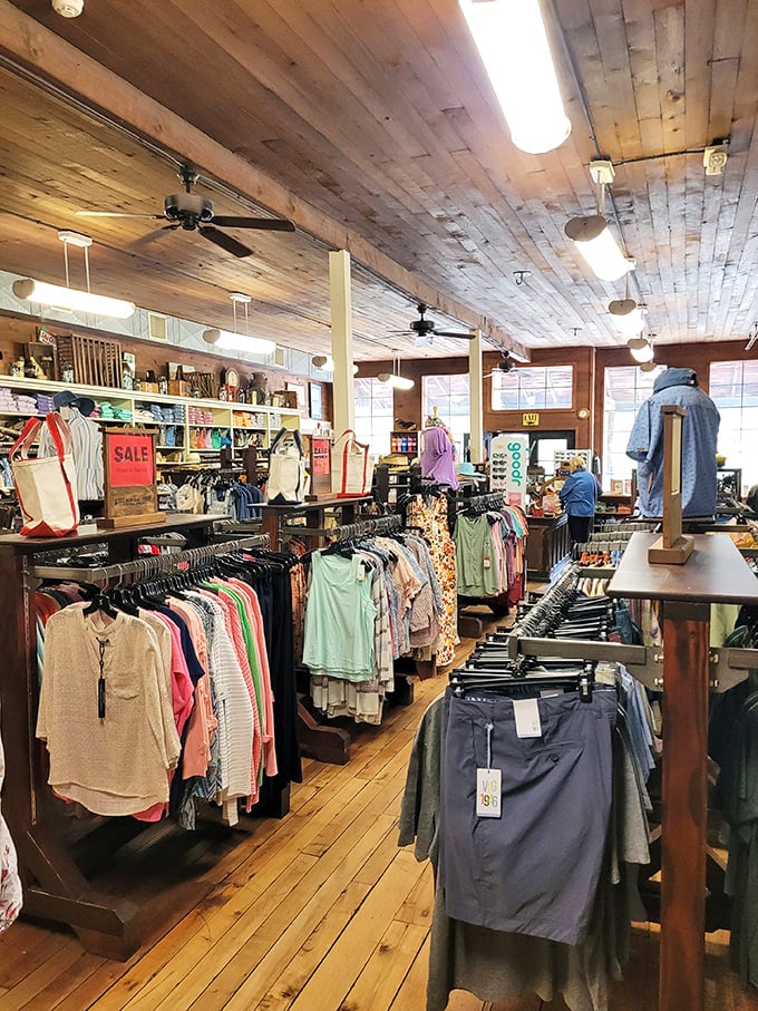 The clothing section offers mountain-ready fashion that promises durability over trends&mdash;where "fast fashion" means quickly zipping your jacket before the rain hits.