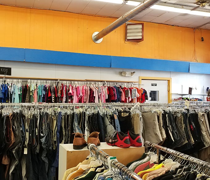 The clothing section's meticulous organization turns what could be chaos into a color-coded shopping experience.