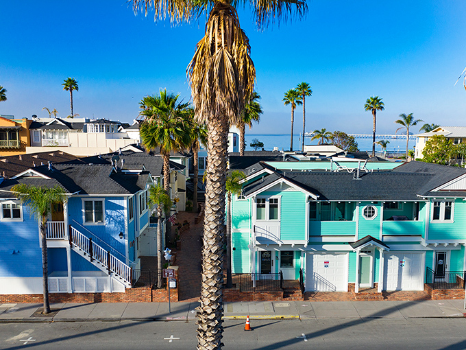 Pastel-colored beach homes line up like a box of saltwater taffy. Living here would ruin you for ordinary neighborhoods forever.