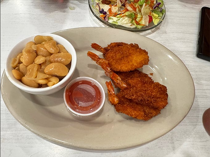 These golden-fried jumbo shrimp with perfectly cooked beans prove that even landlocked Missouri knows how to treat seafood with respect.