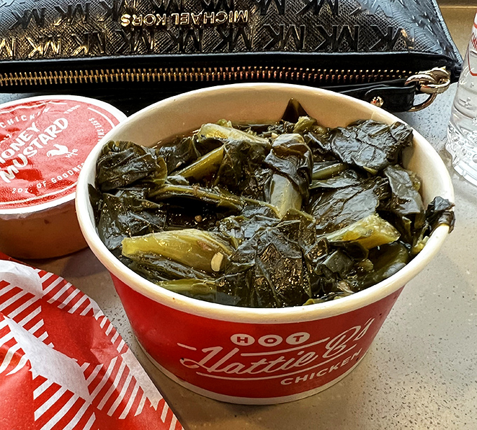 These aren't just collard greens&mdash;they're the soul-soothing Southern counterpoint to all that chicken bravado, cooked low and slow with proper respect.