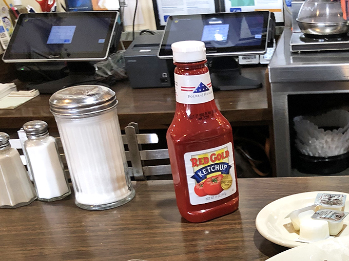 Red Gold ketchup and sugar packets - the supporting actors in the daily drama of American diner life.