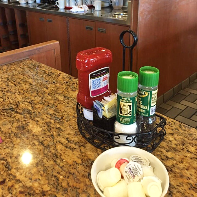 The condiment caddy&mdash;unsung hero of the breakfast table. Those little creamers are just waiting to dive into your coffee cup.