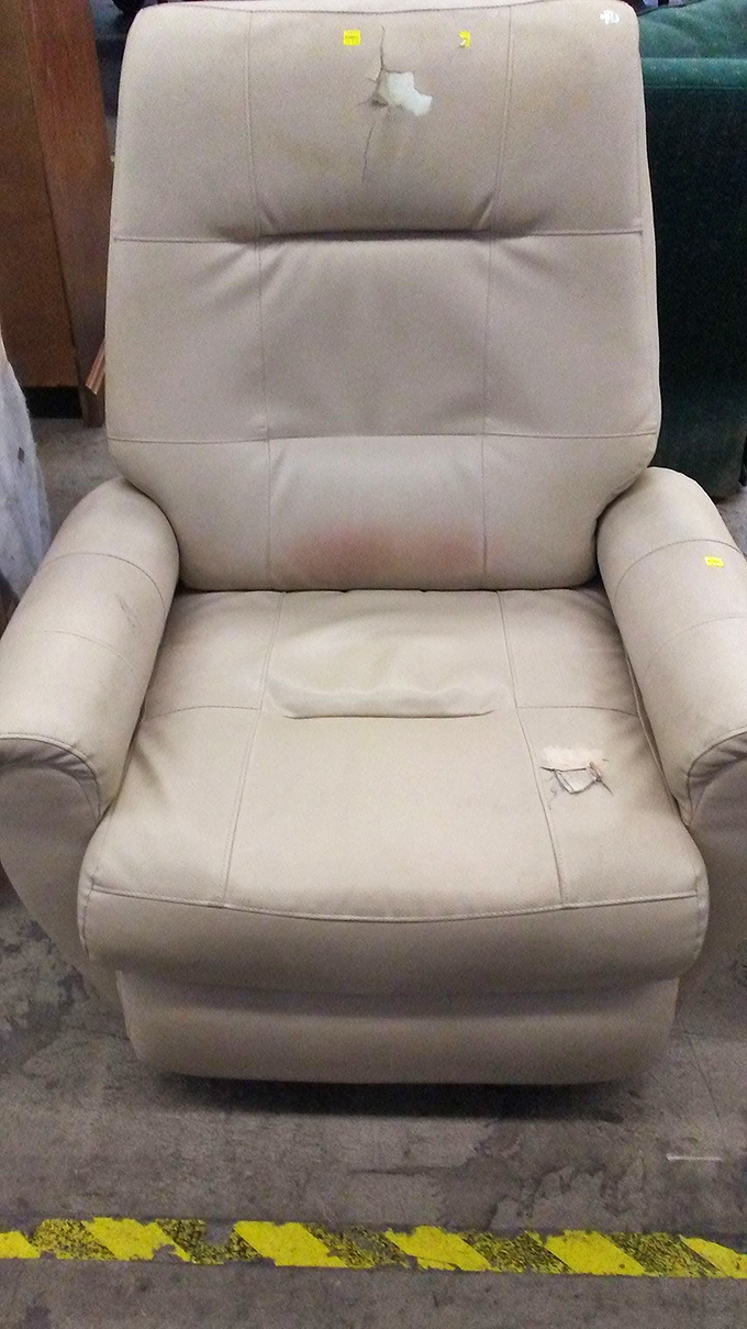 This recliner has seen better days but holds potential for the right visionary. One person's "needs work" is another's "perfect project."