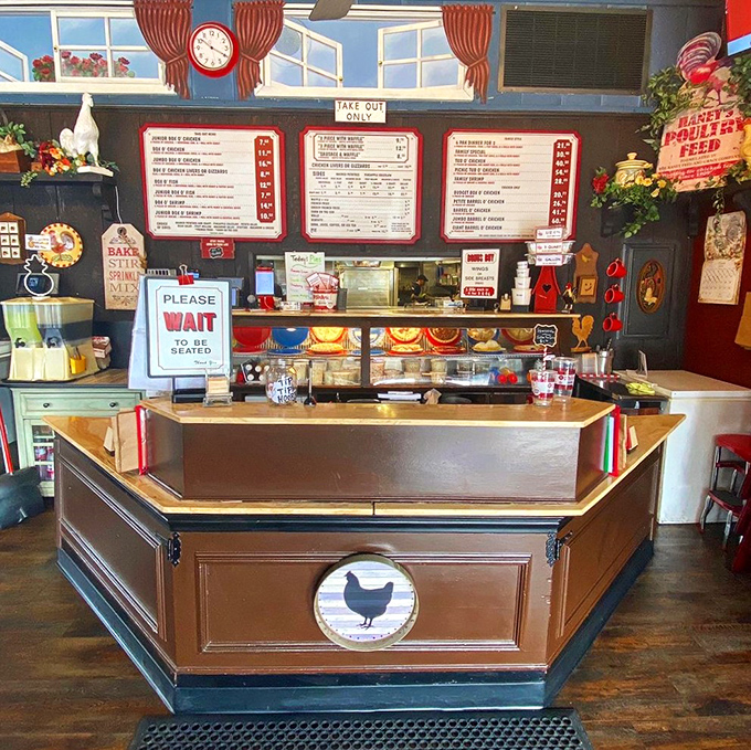 The ordering counter—where dreams come true and diets go to die. Complete with vintage decor, menu boards, and that unmistakable chicken logo announcing you've arrived at flavor town.