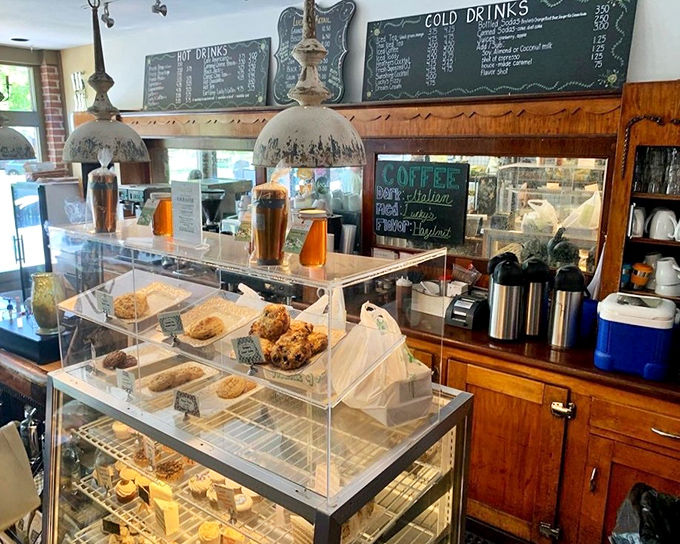 The counter and pastry case&mdash;where willpower goes to die and "I'll just have coffee" turns into "and one of each, please." 