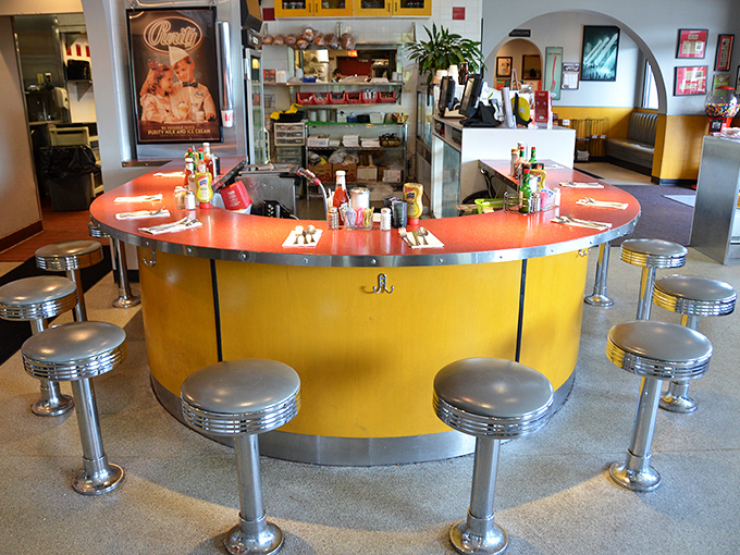 The counter &ndash; where solo diners find community and everyone gets a front-row seat to the deli ballet. Those chrome stools have supported generations of sandwich enthusiasts.