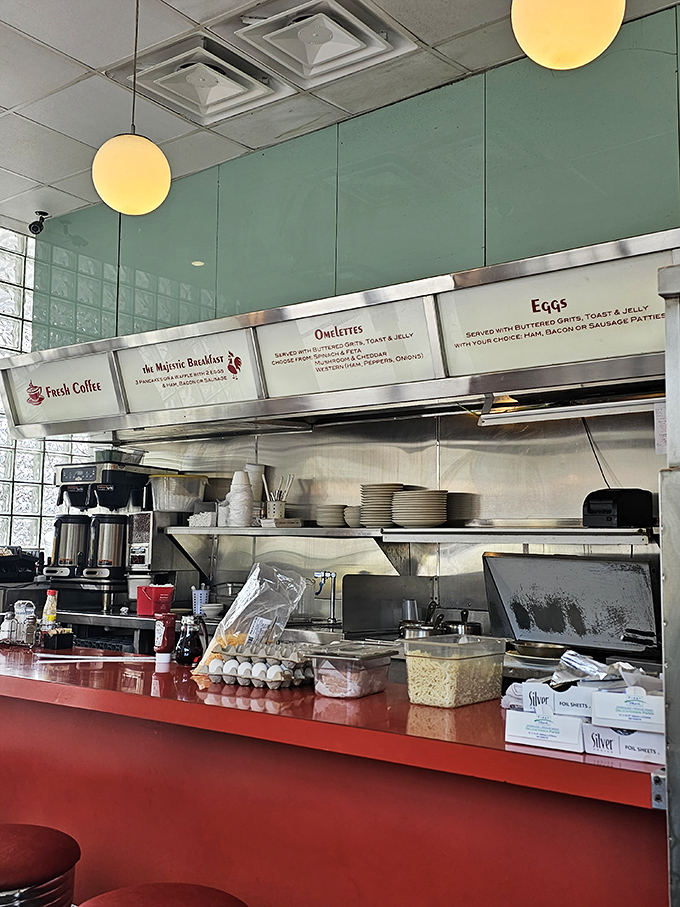 Behind the counter magic happens with military precision&mdash;eggs crack, pancakes flip, and somehow your order arrives exactly when you need it most. 