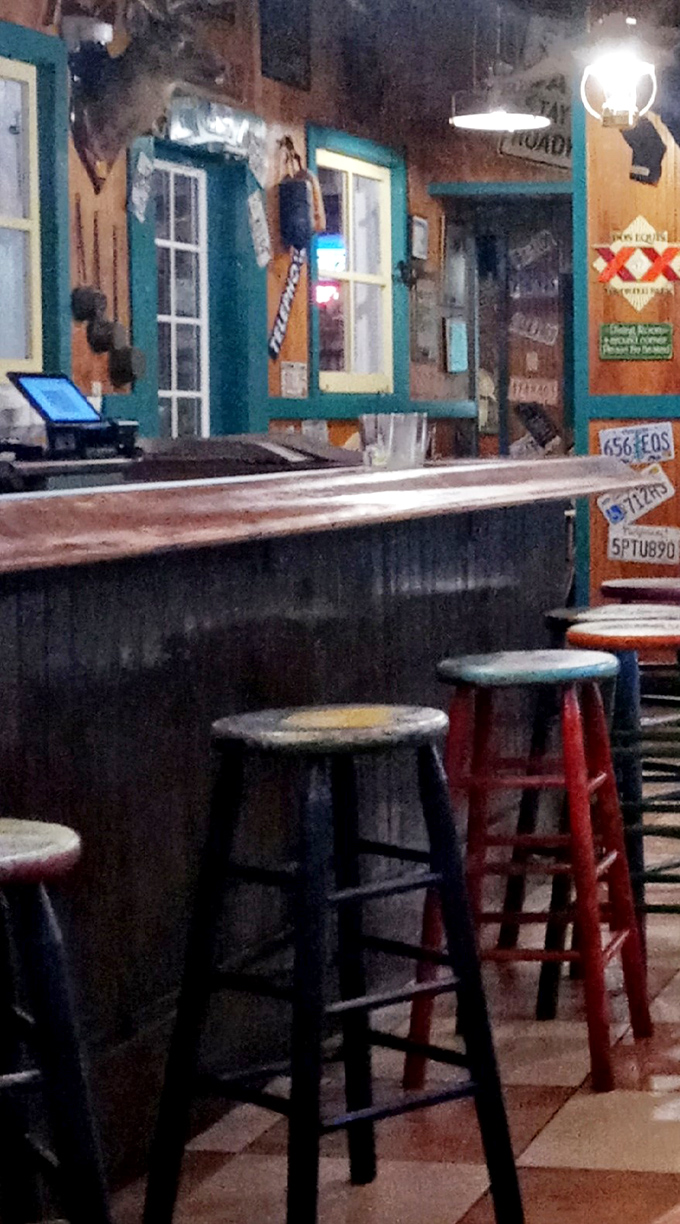 Where every stool has a story. This rustic bar area isn't just seating&mdash;it's where countless seafood celebrations have unfolded.