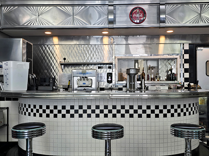 Counter seating offers front-row views of kitchen magic while maintaining that authentic diner counter culture.
