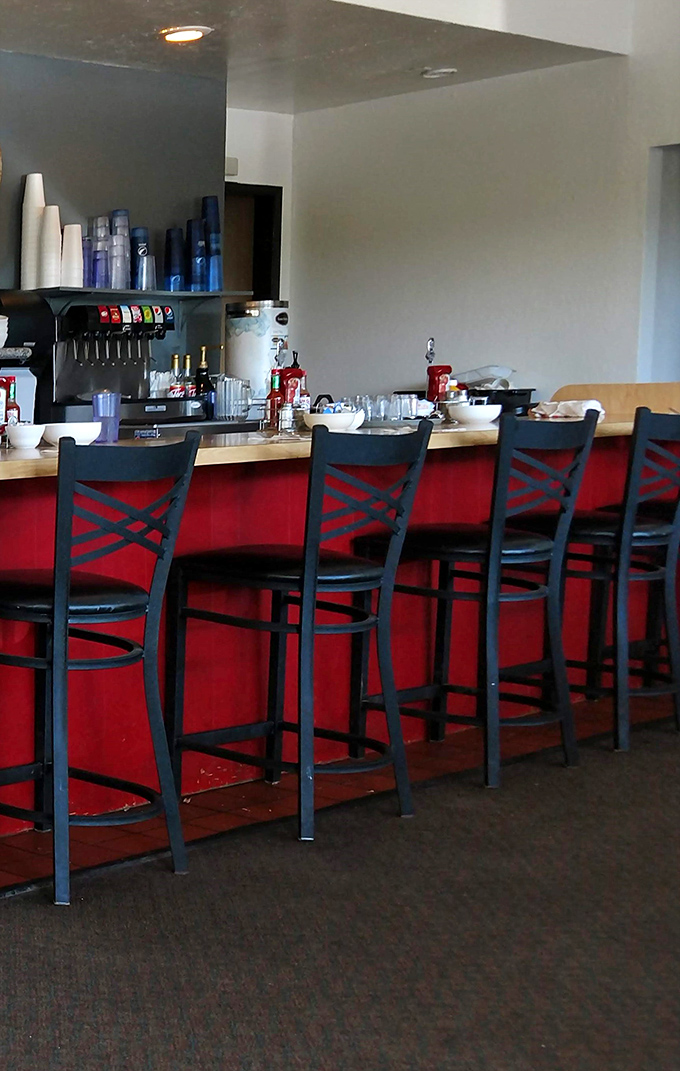 Counter seating: where solo diners become temporary family and the coffee refills happen before you even ask.