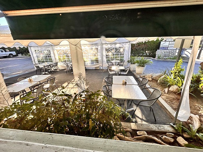 The covered patio offers al fresco dining with protection from both sun and judgment about ordering that second mimosa.