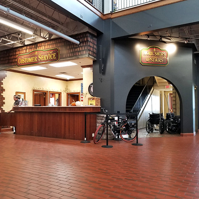 The customer service area stands ready to assist, though the real service is providing a place where retail therapy costs less than actual therapy.