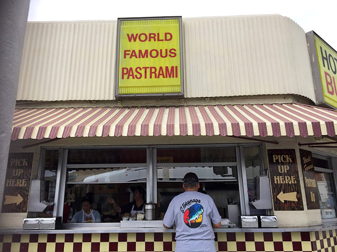 That's not just a customer waiting&mdash;it's someone about to experience the transformative power of properly prepared pastrami.