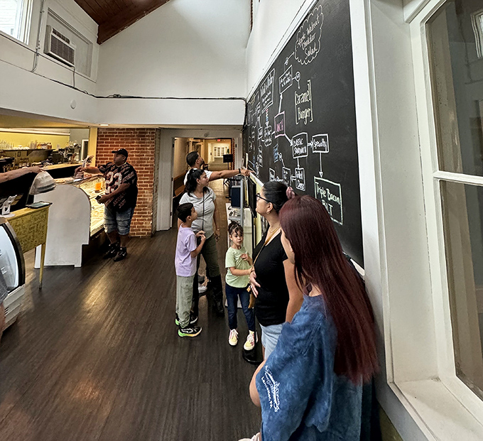 The decision-making flowchart on the wall perfectly captures the eternal question: "Are you trying to be healthy?" (Spoiler: the answer is usually no).