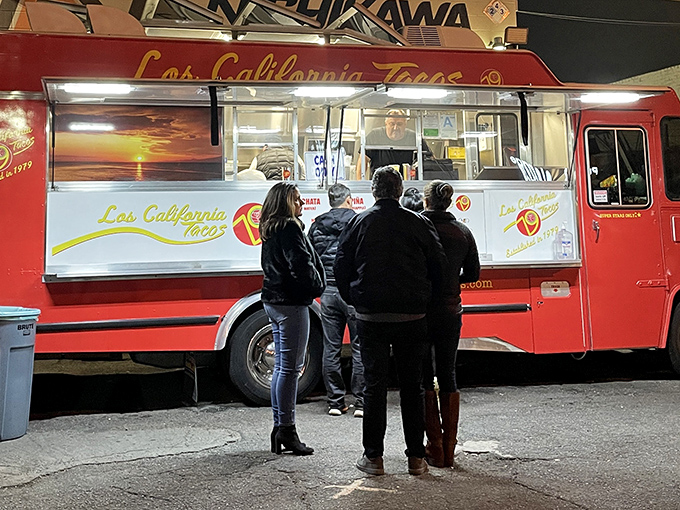 Night gatherings at the taco truck—where strangers become temporary friends united by the universal language of "pass the salsa."