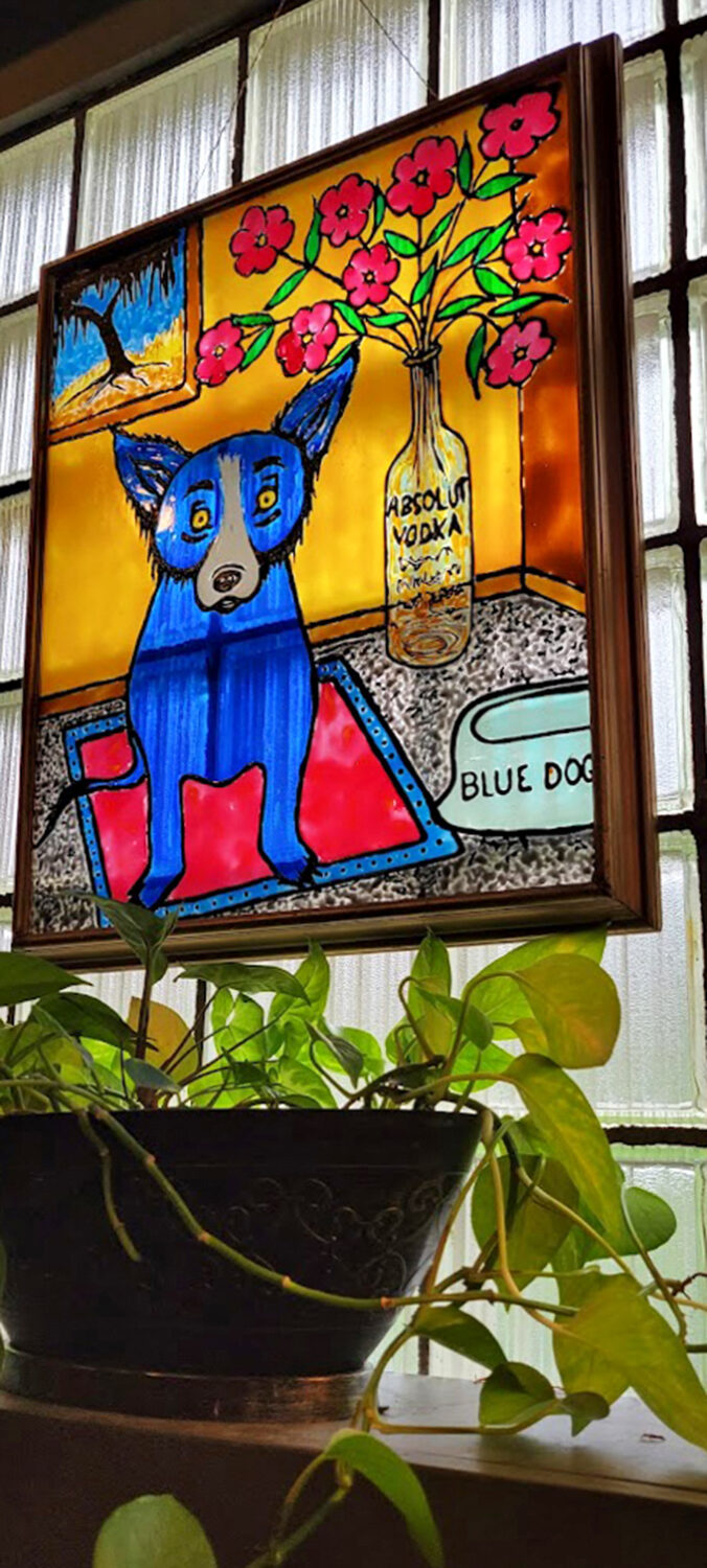 Local art that actually makes sense, including a blue dog who clearly knows where the good treats are.