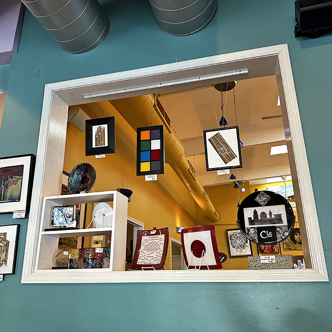 A window to breakfast paradise. This display of local artwork transforms a simple cafe wall into a celebration of Cleveland's creative spirit.