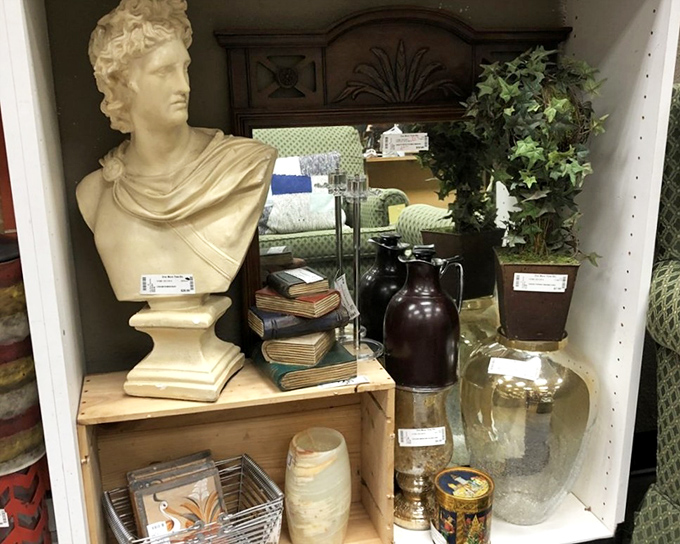 From classical bust to vintage books, this shelf is a time capsule of decorative arts waiting to add character to modern homes.