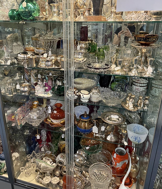 Crystal and glass treasures catch the light and your attention. Each decanter once the pride of someone's holiday table.