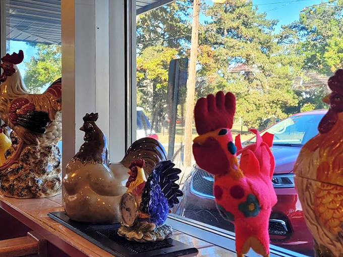 The rooster collection watching over diners &ndash; silent guardians ensuring your breakfast experience is egg-ceptional in every way.